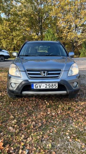 Grey Honda CR-V 2005 in Gulbene, with an engine capacity of 2.00 L and mileage of 200 thousand km for 1900 €, photo 6 on AUTOMOTO.COM.LV