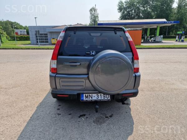Grey Honda CR-V 2006 in Riga, with an engine capacity of 2.20 L and mileage of 292 thousand km for 3000 €, photo 6 on AUTOMOTO.COM.LV