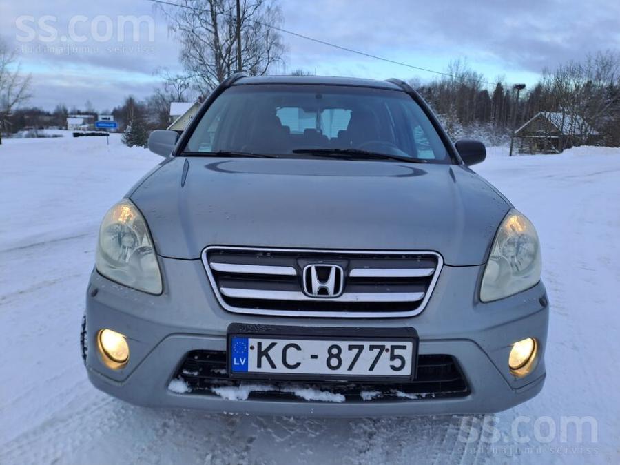 Pelēks Honda CR-V 2006 Alūksne, ar dzinēja tilpumu 2.20 L un nobraukumu 365 tūkst. km par 1770 €, foto 7 vietnē AUTOMOTO.COM.LV