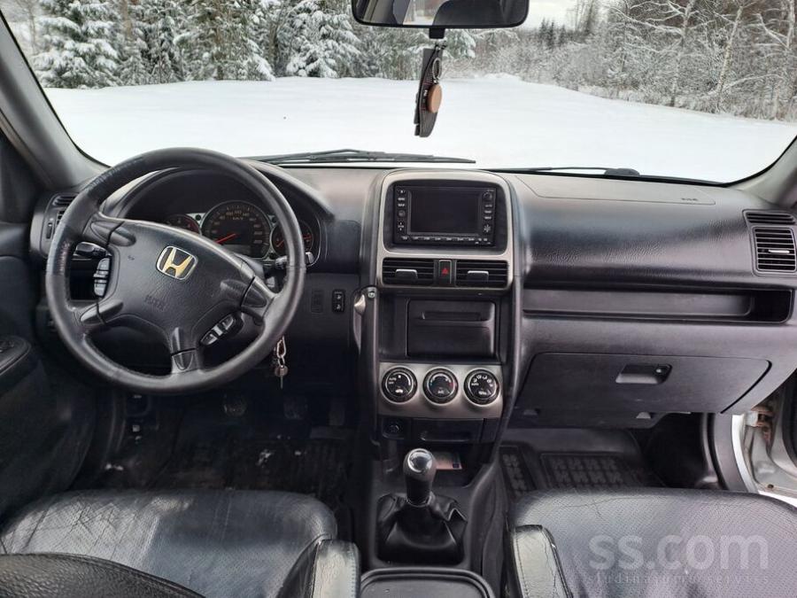 Pelēks Honda CR-V 2006 Alūksne, ar dzinēja tilpumu 2.20 L un nobraukumu 365 tūkst. km par 1770 €, foto 8 vietnē AUTOMOTO.COM.LV