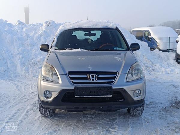 Grey Honda CR-V 2006 in Kretinga, with an engine capacity of 2.20 L and mileage of 298 thousand km for 3550 €, photo 1 on AUTOMOTO.COM.LV