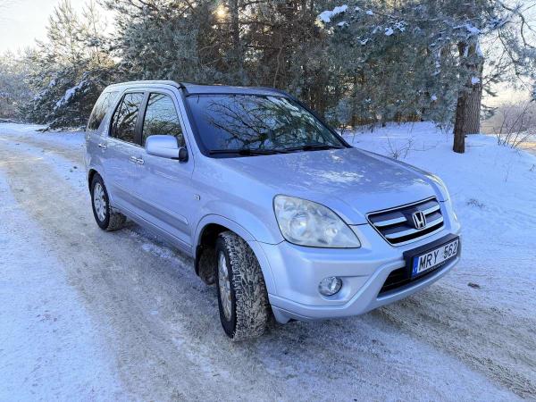 Grey Honda CR-V 2006 in Vilnius, with an engine capacity of 2.20 L and mileage of 260 thousand km for 2450 €, photo 2 on AUTOMOTO.COM.LV