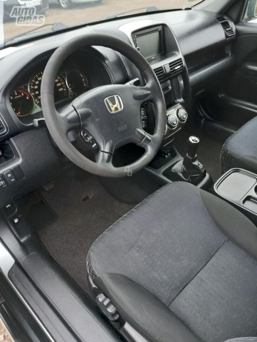 Pelēks Honda CR-V 2006 Utena, ar dzinēja tilpumu 2.20 L un nobraukumu 300 tūkst. km par 3100 €, foto 10 vietnē AUTOMOTO.COM.LV