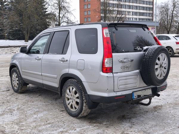 Grey Honda CR-V 2006 in Alytus, with an engine capacity of 2.20 L and mileage of 300 thousand km for 2400 €, photo 4 on AUTOMOTO.COM.LV