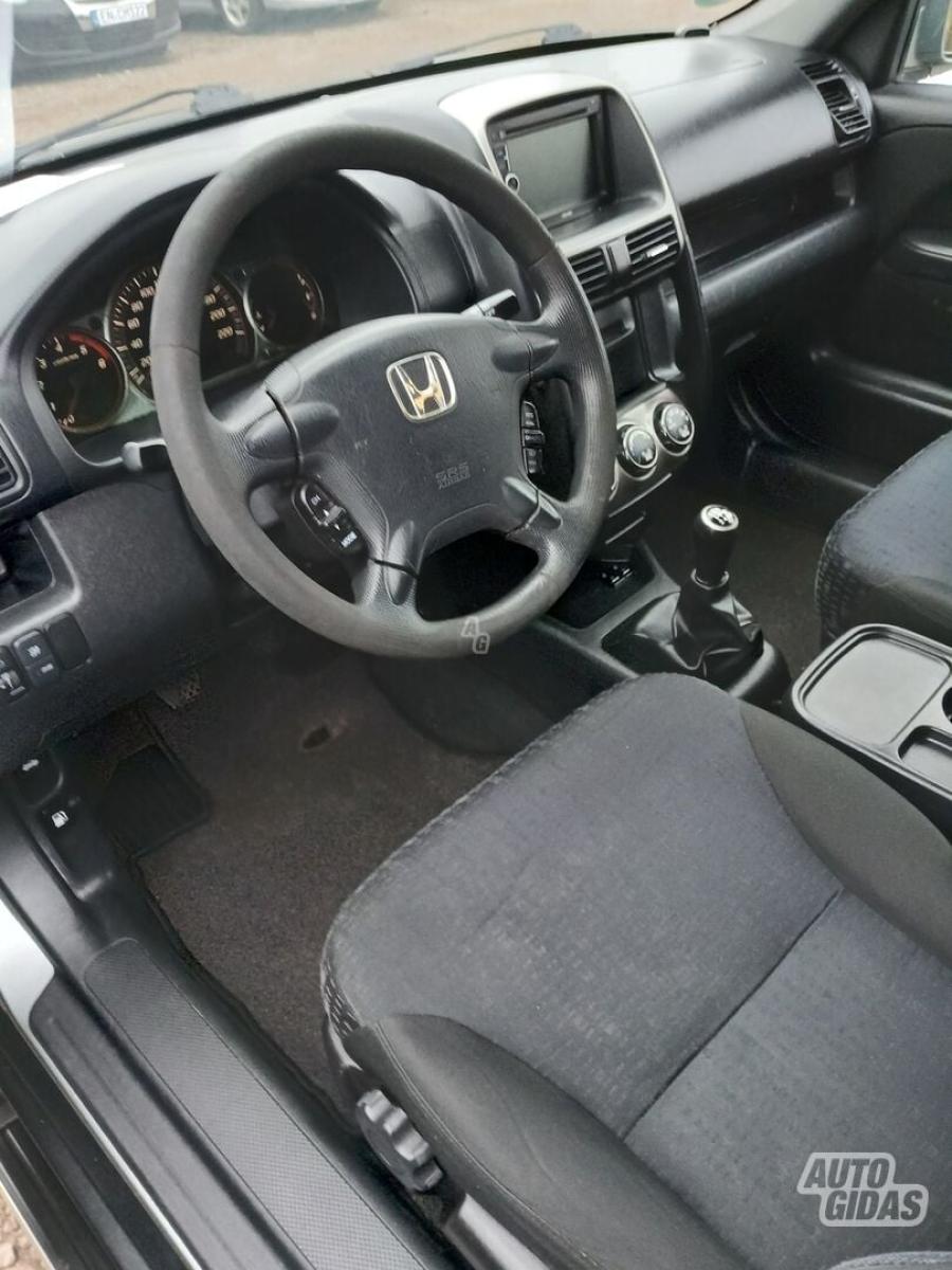 Pelēks Honda CR-V 2006 Utena, ar dzinēja tilpumu 2.20 L un nobraukumu 300 tūkst. km par 3100 €, foto 6 vietnē AUTOMOTO.COM.LV