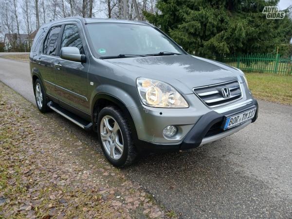 Grey Honda CR-V 2006 in Utena, with an engine capacity of 2.20 L and mileage of 300 thousand km for 3100 €, photo 9 on AUTOMOTO.COM.LV
