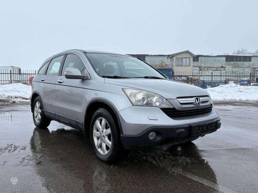 Pelēks Honda CR-V 2006 Marijampole, ar dzinēja tilpumu 2.00 L un nobraukumu 299 tūkst. km par 3150 €, foto 1 vietnē AUTOMOTO.COM.LV