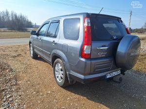 Pelēks Honda CR-V 2006 Alīta, ar dzinēja tilpumu 2.20 L un nobraukumu 330 tūkst. km par 2650 €, foto 3 vietnē AUTOMOTO.COM.LV