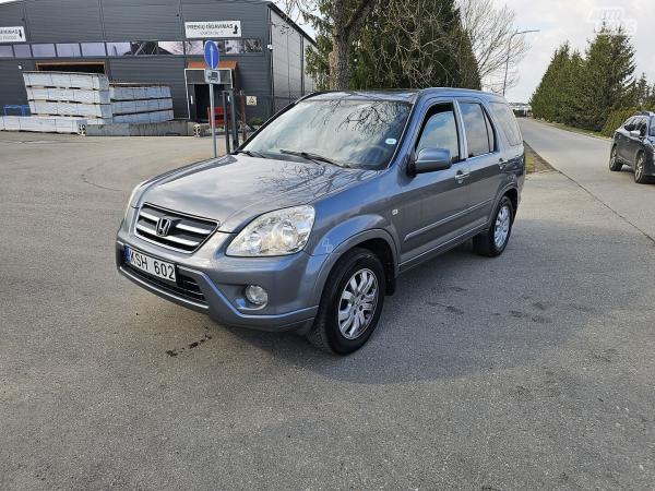 Pelēks Honda CR-V 2006 Kauņa, ar dzinēja tilpumu 2.20 L un nobraukumu 330 tūkst. km par 2850 €, foto 4 vietnē AUTOMOTO.COM.LV