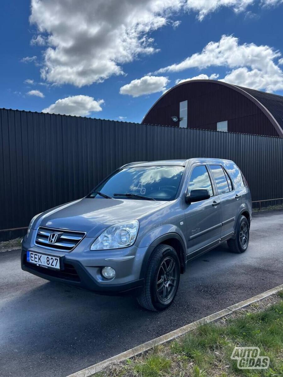 Grey Honda CR-V 2006 in Marijampole, with an engine capacity of 2.20 L and mileage of 314 thousand km for 2750 €, photo 1 on AUTOMOTO.COM.LV