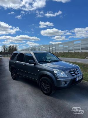 Grey Honda CR-V 2006 in Marijampole, with an engine capacity of 2.20 L and mileage of 314 thousand km for 2750 €, photo 3 on AUTOMOTO.COM.LV