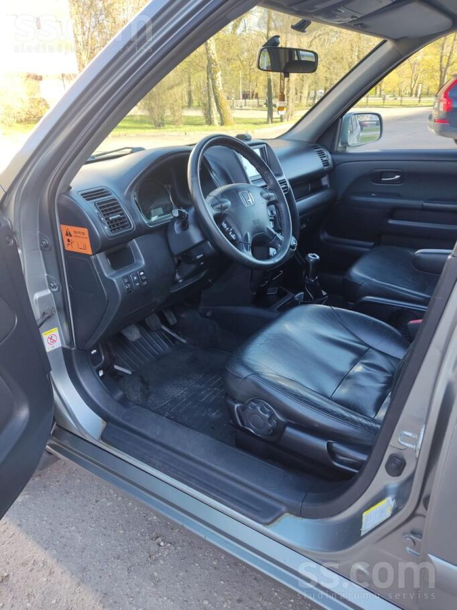 Pelēks Honda CR-V 2006 Rīga, ar dzinēja tilpumu 2.20 L un nobraukumu 157 tūkst. km par 5700 €, foto 3 vietnē AUTOMOTO.COM.LV
