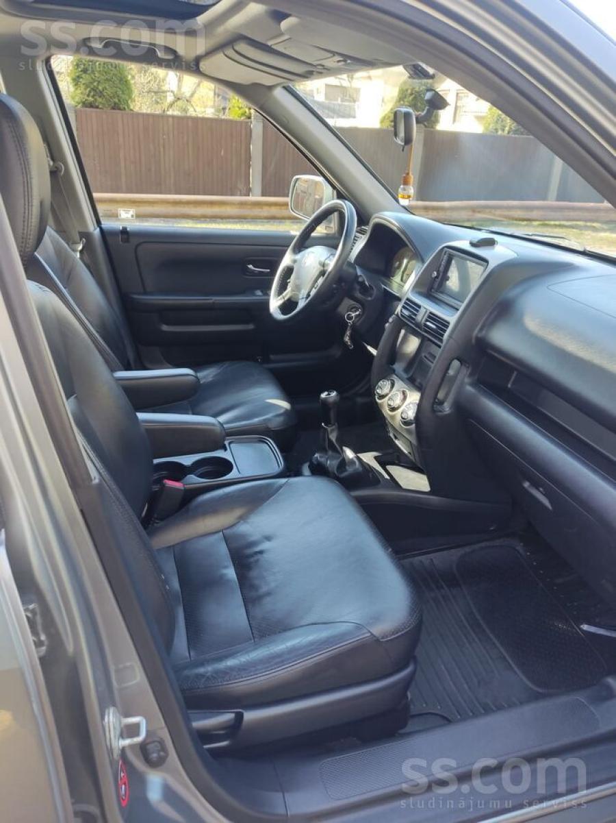 Pelēks Honda CR-V 2006 Rīga, ar dzinēja tilpumu 2.20 L un nobraukumu 157 tūkst. km par 5700 €, foto 11 vietnē AUTOMOTO.COM.LV