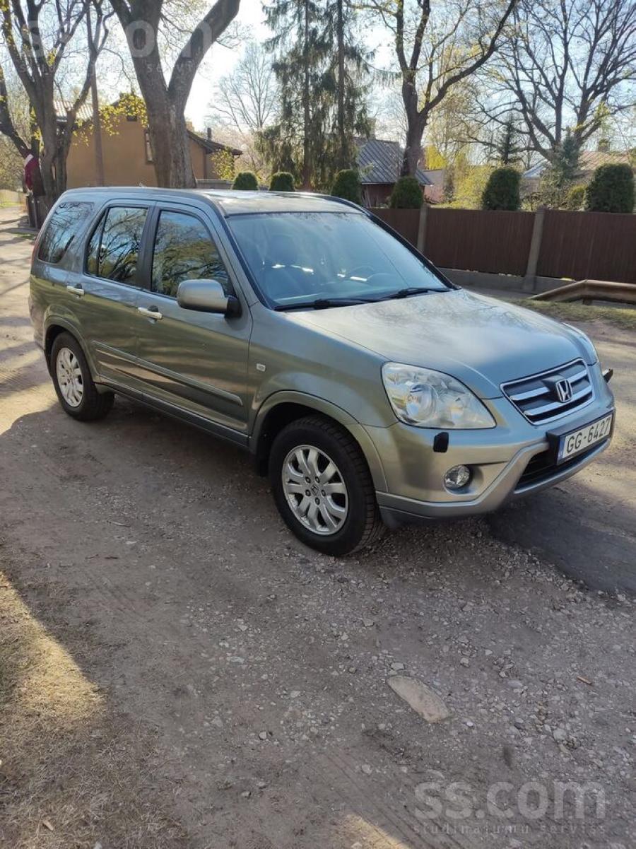 Pelēks Honda CR-V 2006 Rīga, ar dzinēja tilpumu 2.20 L un nobraukumu 157 tūkst. km par 5700 €, foto 13 vietnē AUTOMOTO.COM.LV