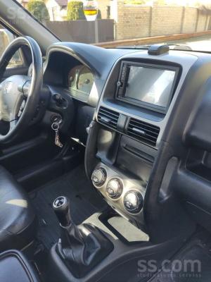 Pelēks Honda CR-V 2006 Rīga, ar dzinēja tilpumu 2.20 L un nobraukumu 157 tūkst. km par 5700 €, foto 15 vietnē AUTOMOTO.COM.LV