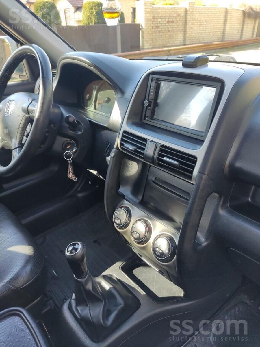 Pelēks Honda CR-V 2006 Rīga, ar dzinēja tilpumu 2.20 L un nobraukumu 157 tūkst. km par 5700 €, foto 15 vietnē AUTOMOTO.COM.LV