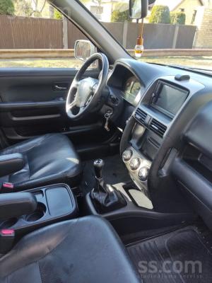 Pelēks Honda CR-V 2006 Rīga, ar dzinēja tilpumu 2.20 L un nobraukumu 157 tūkst. km par 5700 €, foto 16 vietnē AUTOMOTO.COM.LV
