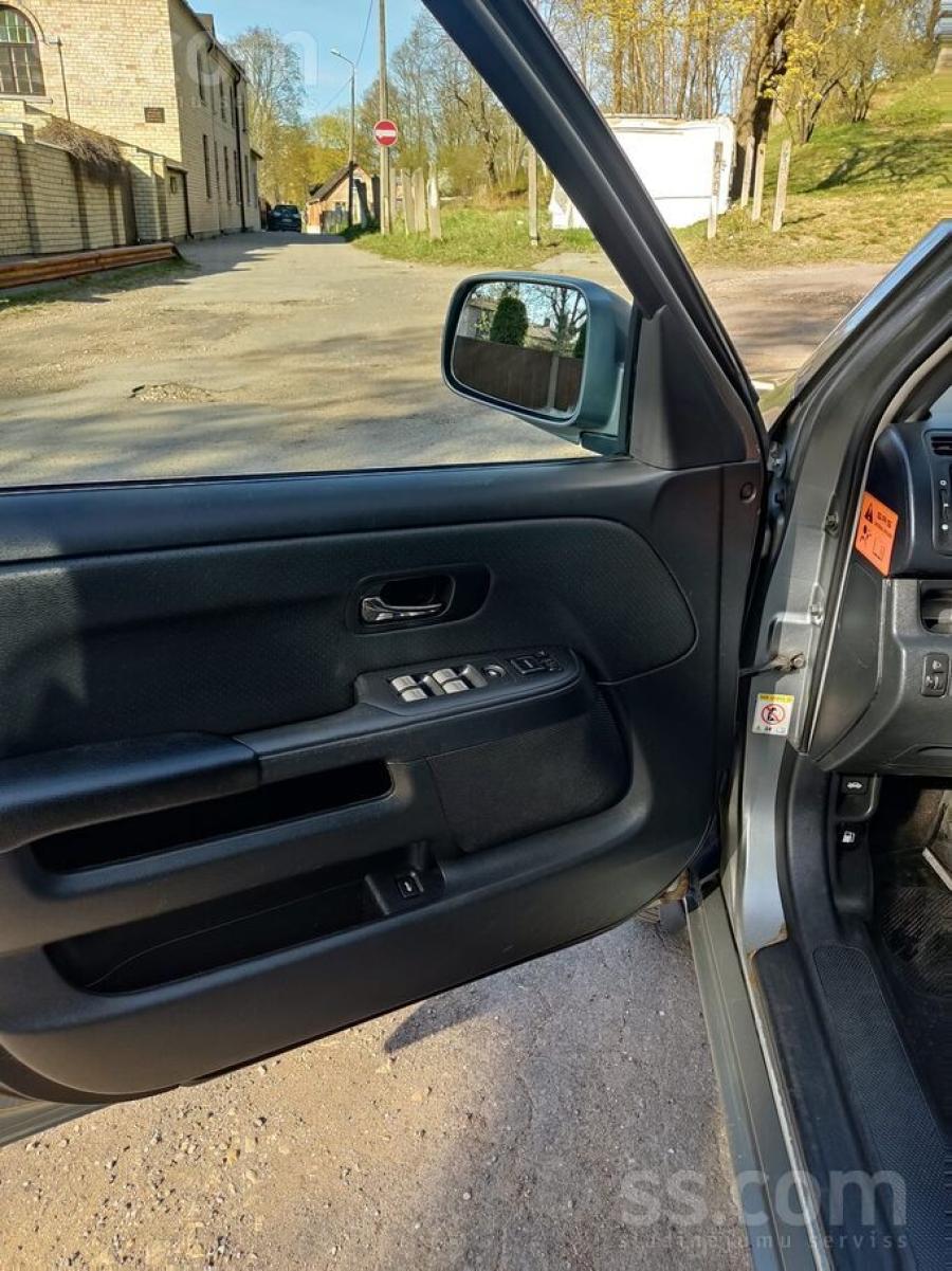 Pelēks Honda CR-V 2006 Rīga, ar dzinēja tilpumu 2.20 L un nobraukumu 157 tūkst. km par 5700 €, foto 21 vietnē AUTOMOTO.COM.LV