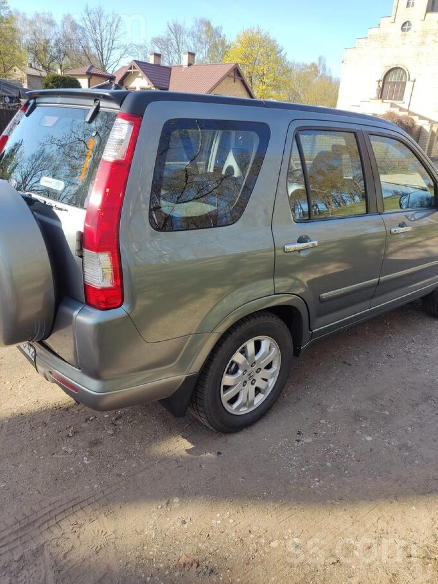 Pelēks Honda CR-V 2006 Rīga, ar dzinēja tilpumu 2.20 L un nobraukumu 157 tūkst. km par 5700 €, foto 23 vietnē AUTOMOTO.COM.LV