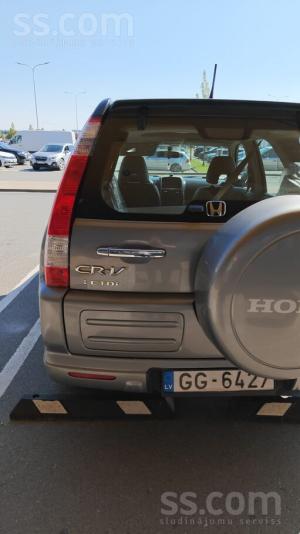 Pelēks Honda CR-V 2006 Rīga, ar dzinēja tilpumu 2.20 L un nobraukumu 157 tūkst. km par 4900 €, foto 25 vietnē AUTOMOTO.COM.LV
