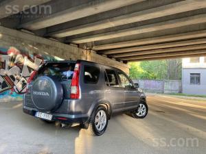 Pelēks Honda CR-V 2006 Rīga, ar dzinēja tilpumu 2.00 L un nobraukumu 204 tūkst. km par 2690 €, foto 3 vietnē AUTOMOTO.COM.LV