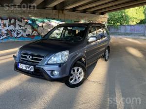 Pelēks Honda CR-V 2006 Rīga, ar dzinēja tilpumu 2.00 L un nobraukumu 204 tūkst. km par 2690 €, foto 5 vietnē AUTOMOTO.COM.LV