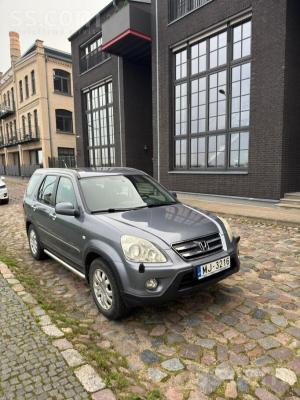 Grey Honda CR-V 2006 in Riga, with an engine capacity of 2.20 L and mileage of 265 thousand km for 3550 €, photo  on AUTOMOTO.COM.LV