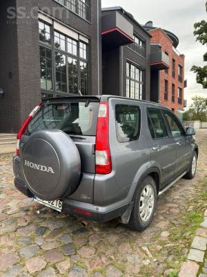 Pelēks Honda CR-V 2006 Rīga, ar dzinēja tilpumu 2.20 L un nobraukumu 265 tūkst. km par 3550 €, foto 3 vietnē AUTOMOTO.COM.LV
