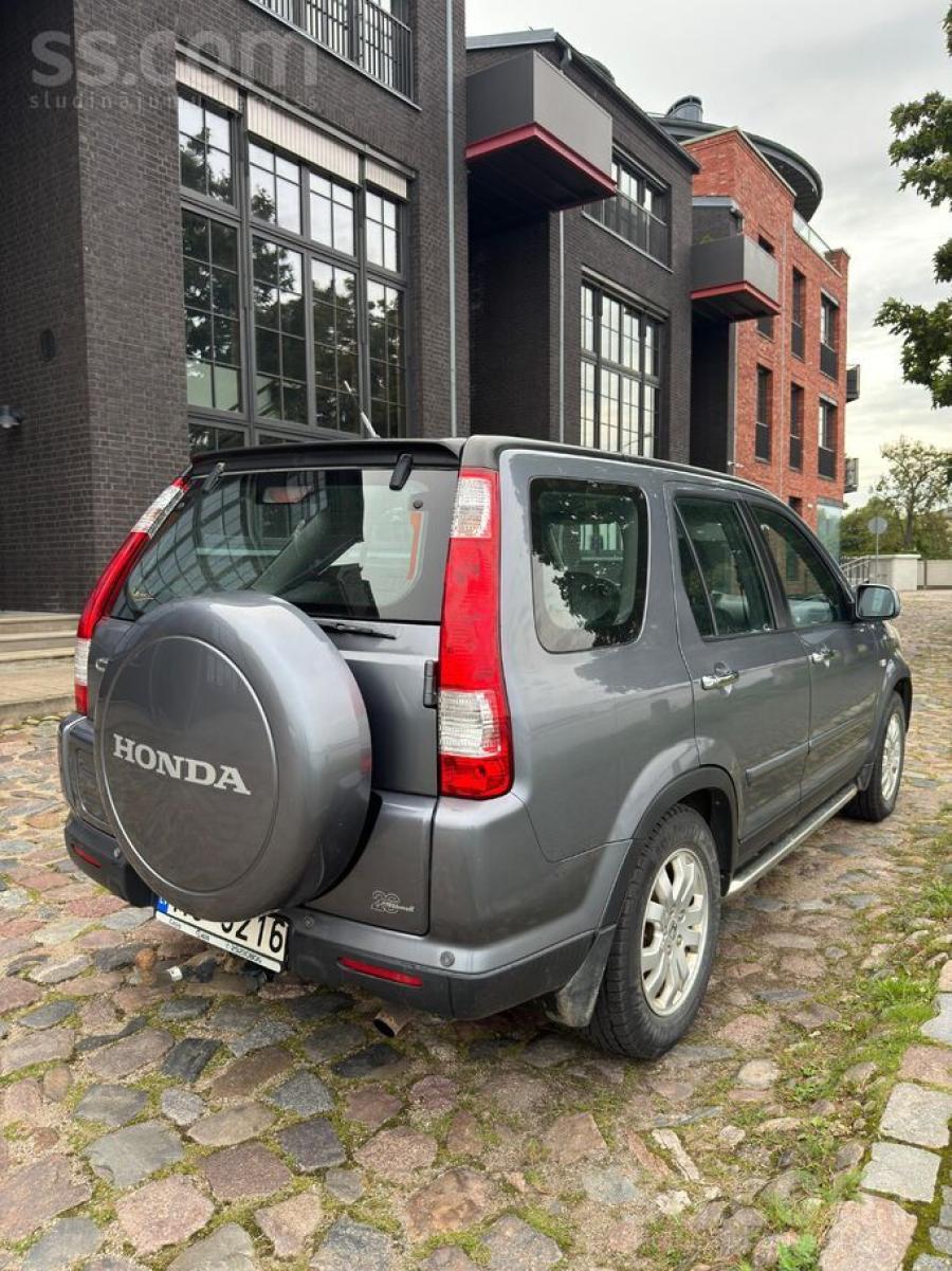 Pelēks Honda CR-V 2006 Rīga, ar dzinēja tilpumu 2.20 L un nobraukumu 265 tūkst. km par 3550 €, foto 3 vietnē AUTOMOTO.COM.LV