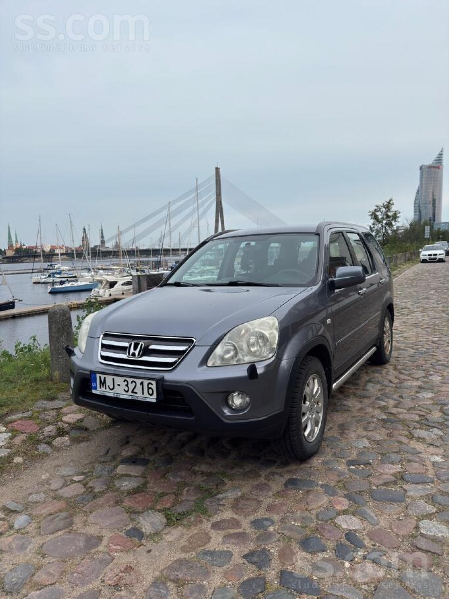 Pelēks Honda CR-V 2006 Rīga, ar dzinēja tilpumu 2.20 L un nobraukumu 265 tūkst. km par 3550 €, foto 4 vietnē AUTOMOTO.COM.LV