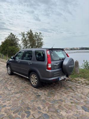 Pelēks Honda CR-V 2006 Rīga, ar dzinēja tilpumu 2.20 L un nobraukumu 265 tūkst. km par 3550 €, foto 5 vietnē AUTOMOTO.COM.LV