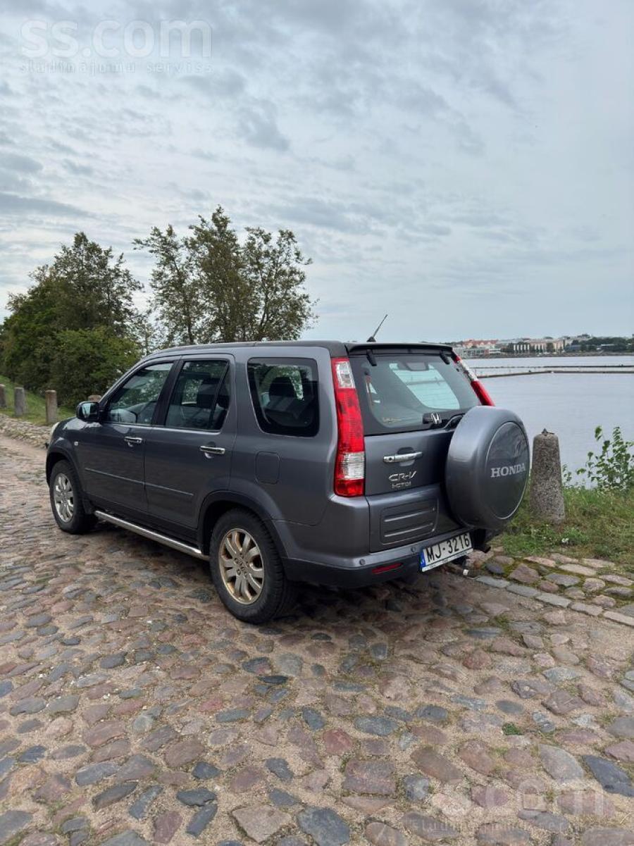 Pelēks Honda CR-V 2006 Rīga, ar dzinēja tilpumu 2.20 L un nobraukumu 265 tūkst. km par 3550 €, foto 5 vietnē AUTOMOTO.COM.LV
