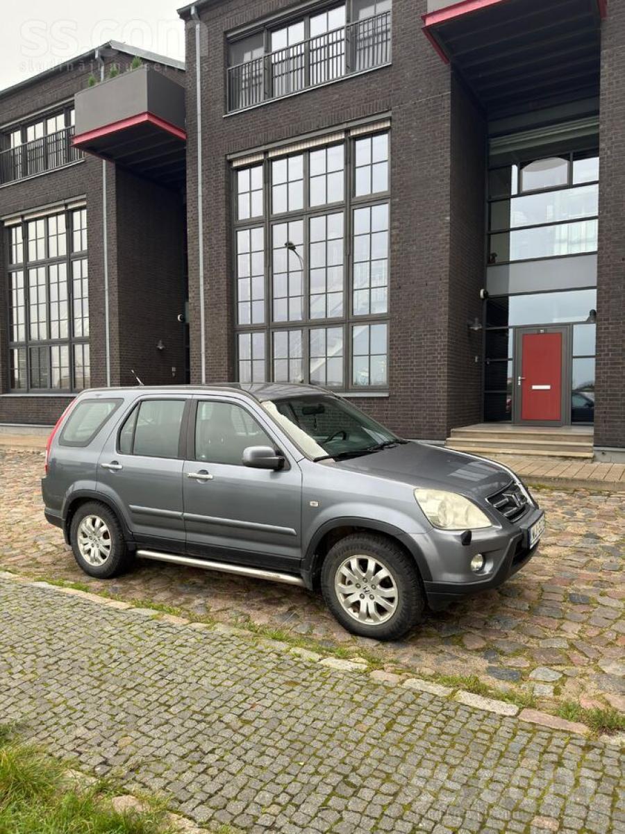 Pelēks Honda CR-V 2006 Rīga, ar dzinēja tilpumu 2.20 L un nobraukumu 265 tūkst. km par 3550 €, foto 9 vietnē AUTOMOTO.COM.LV
