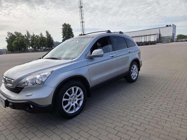 Grey Honda CR-V 2006 in Marijampole, with an engine capacity of 2.00 L and mileage of 226 thousand km for 3950 €, photo 1 on AUTOMOTO.COM.LV