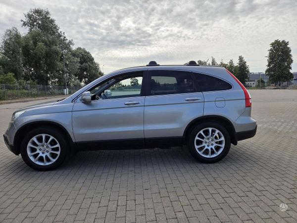 Grey Honda CR-V 2006 in Marijampole, with an engine capacity of 2.00 L and mileage of 226 thousand km for 3950 €, photo 6 on AUTOMOTO.COM.LV