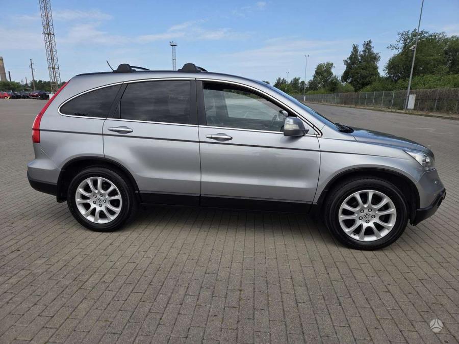 Pelēks Honda CR-V 2006 Marijampole, ar dzinēja tilpumu 2.00 L un nobraukumu 226 tūkst. km par 3950 €, foto 5 vietnē AUTOMOTO.COM.LV