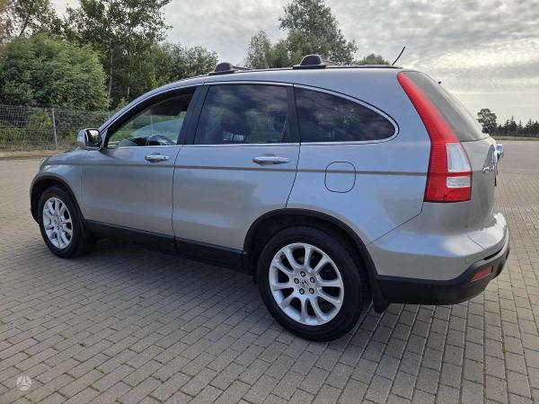 Pelēks Honda CR-V 2006 Marijampole, ar dzinēja tilpumu 2.00 L un nobraukumu 226 tūkst. km par 3950 €, foto 5 vietnē AUTOMOTO.COM.LV