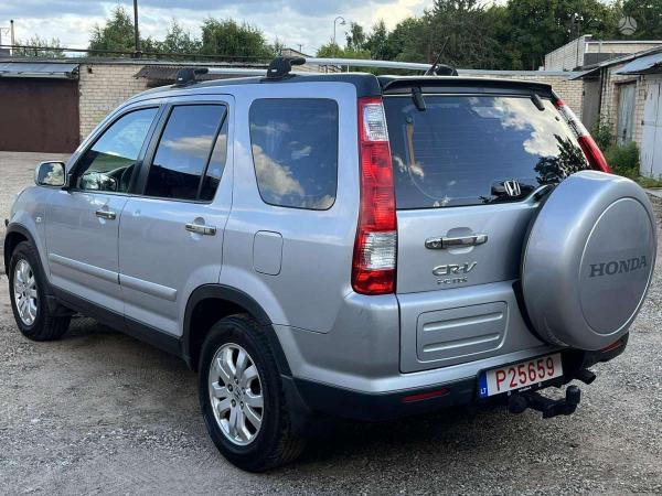 Grey Honda CR-V 2006 in Jonava, with an engine capacity of 2.20 L and mileage of 322 thousand km for 3000 €, photo 4 on AUTOMOTO.COM.LV