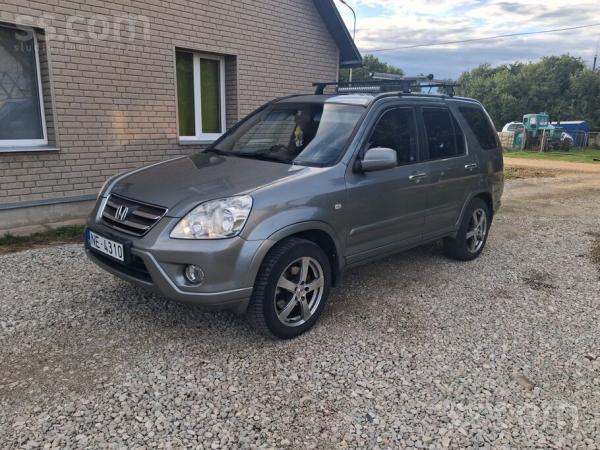 Pelēks Honda CR-V 2006 Rīga, ar dzinēja tilpumu 2.20 L un nobraukumu 323 tūkst. km par 2650 €, foto 1 vietnē AUTOMOTO.COM.LV