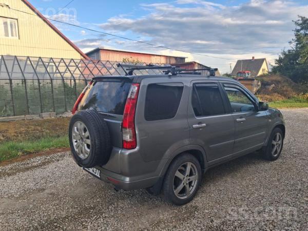 Pelēks Honda CR-V 2006 Rīga, ar dzinēja tilpumu 2.20 L un nobraukumu 323 tūkst. km par 2650 €, foto 3 vietnē AUTOMOTO.COM.LV