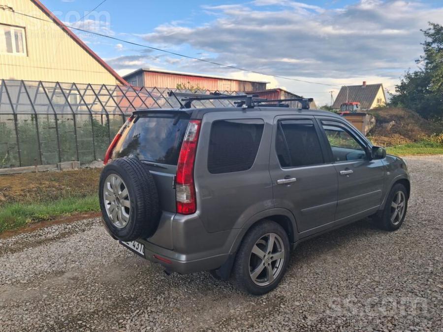Grey Honda CR-V 2006 in Riga, with an engine capacity of 2.20 L and mileage of 323 thousand km for 2650 €, photo 4 on AUTOMOTO.COM.LV