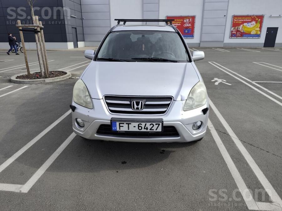 Pelēks Honda CR-V 2006 Rīga, ar dzinēja tilpumu 2.20 L un nobraukumu 317 tūkst. km par 1600 €, foto 6 vietnē AUTOMOTO.COM.LV
