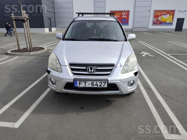 Pelēks Honda CR-V 2006 Rīga, ar dzinēja tilpumu 2.20 L un nobraukumu 317 tūkst. km par 1600 €, foto 5 vietnē AUTOMOTO.COM.LV