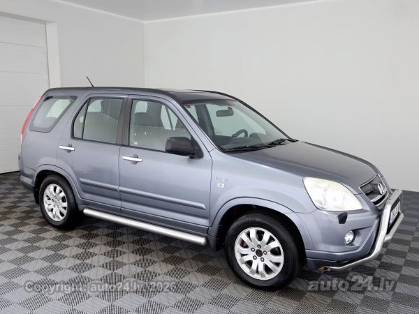 Grey Honda CR-V 2006 in Tallinn, with an engine capacity of 2.00 L and mileage of 404 thousand km for 1399 €, photo 1 on AUTOMOTO.COM.LV