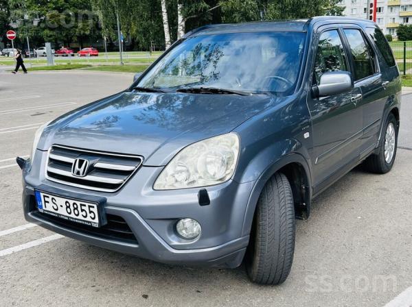 Pelēks Honda CR-V 2006 Rīga, ar dzinēja tilpumu 2.00 L un nobraukumu 404 tūkst. km par 2000 €, foto 1 vietnē AUTOMOTO.COM.LV