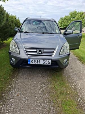 Pelēks Honda CR-V 2006 Alīta, ar dzinēja tilpumu 2.20 L un nobraukumu 304 tūkst. km par 4000 €, foto 3 vietnē AUTOMOTO.COM.LV