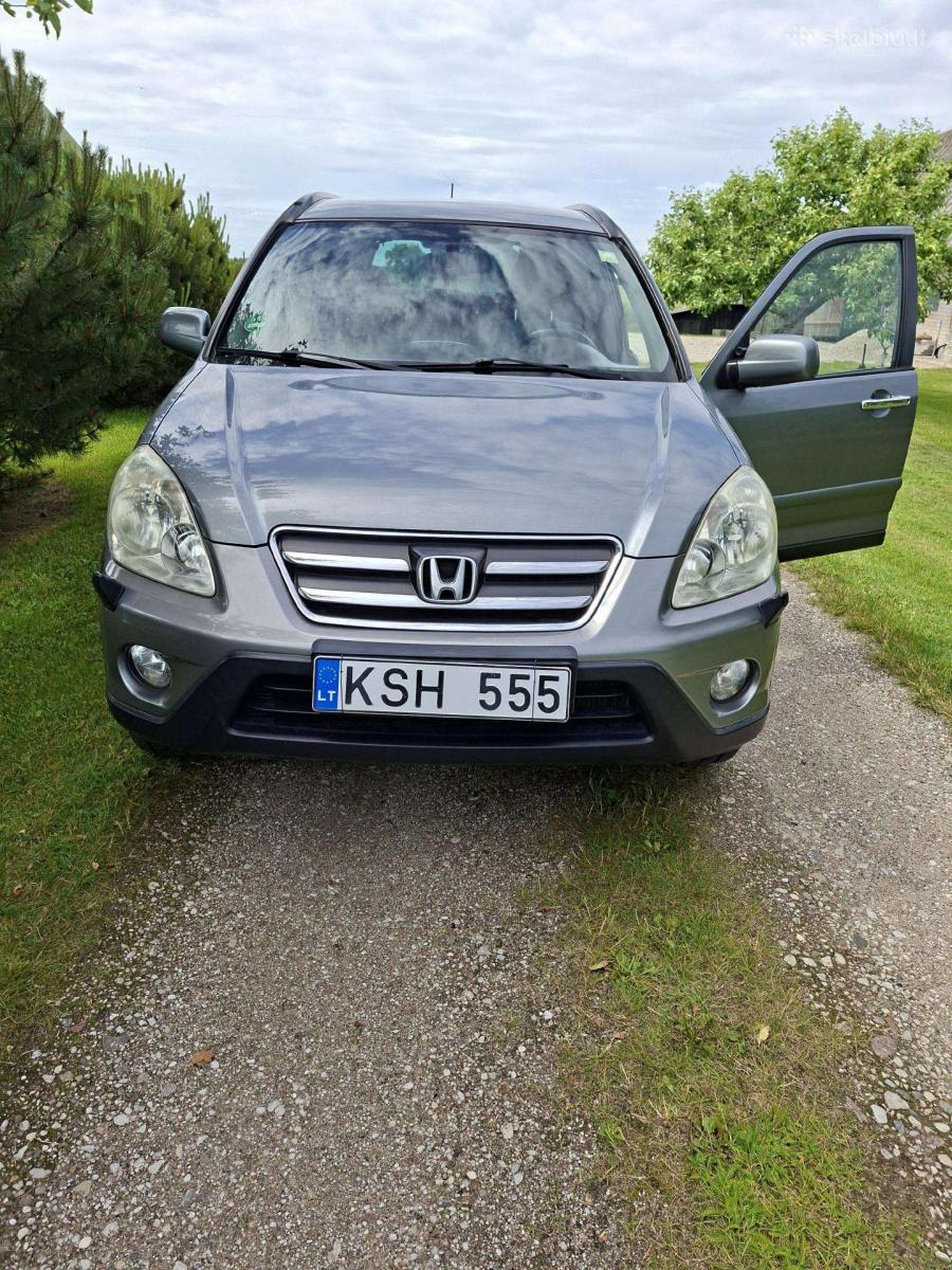 Pelēks Honda CR-V 2006 Alīta, ar dzinēja tilpumu 2.20 L un nobraukumu 304 tūkst. km par 4000 €, foto 3 vietnē AUTOMOTO.COM.LV