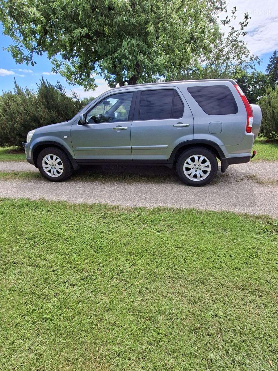 Pelēks Honda CR-V 2006 Alīta, ar dzinēja tilpumu 2.20 L un nobraukumu 304 tūkst. km par 4000 €, foto 6 vietnē AUTOMOTO.COM.LV