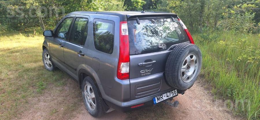 Pelēks Honda CR-V 2006 Balvi, ar dzinēja tilpumu 2.20 L un nobraukumu 303 tūkst. km par 2000 €, foto 4 vietnē AUTOMOTO.COM.LV