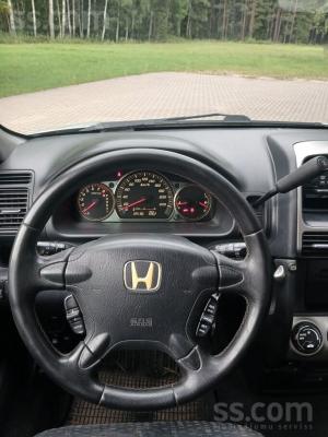 Grey Honda CR-V 2006 in Talsi, with an engine capacity of 2.00 L and mileage of 225 thousand km for 2250 €, photo 8 on AUTOMOTO.COM.LV
